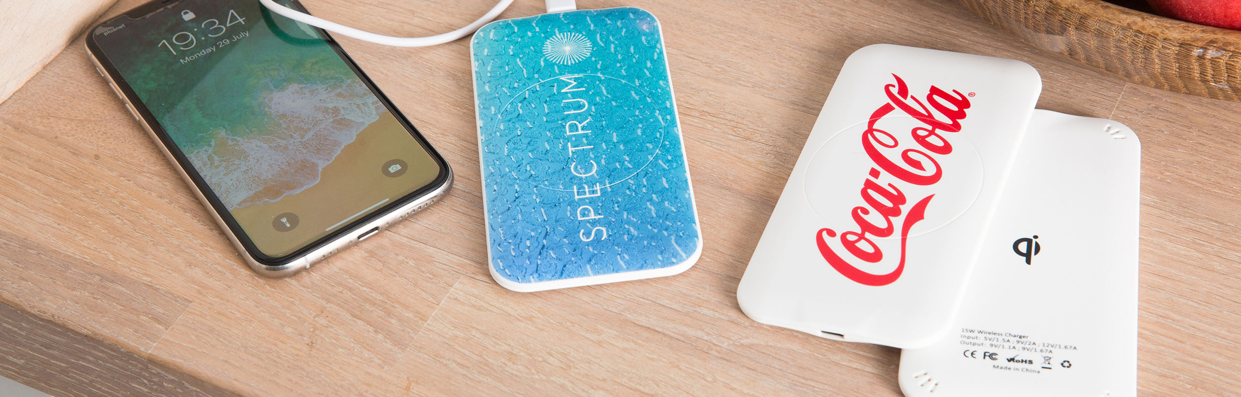 Branded power banks and custom printed charging pads